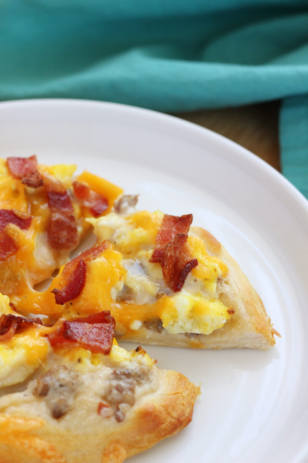 Easy Breakfast Pizza Recipe (made with biscuits) - One Sweet Appetite