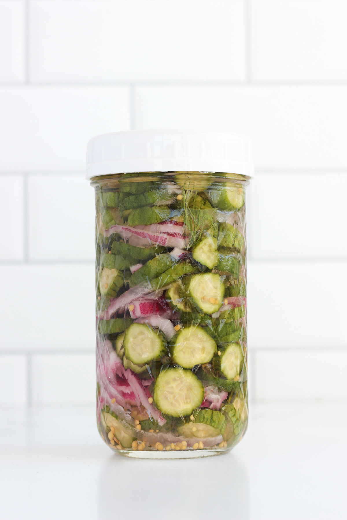 Easy Refrigerator Pickles Recipe - One Sweet Appetite